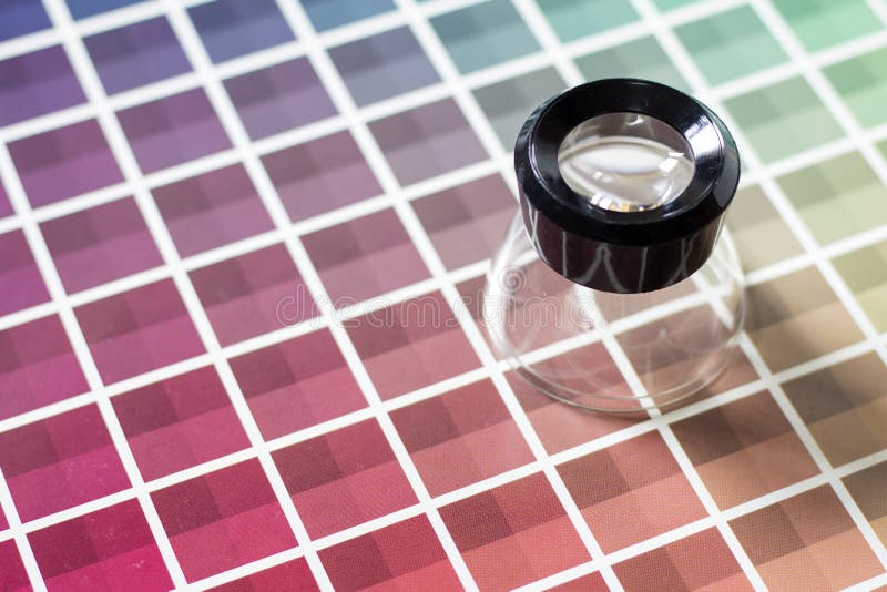 Magnifier on a color chart stock image. Image of magenta - 77607231
