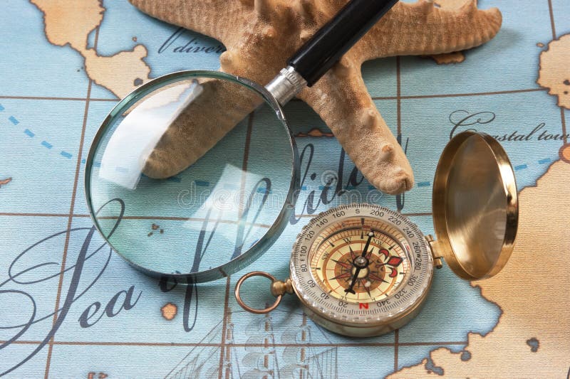 Magnifier and Compass on Map Stock Image - Image of compass, discovery ...