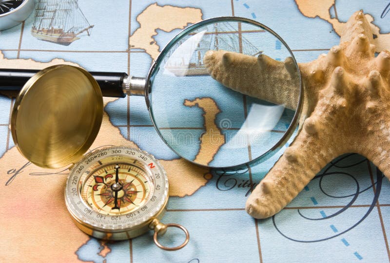 Magnifier and Compass on Map Stock Photo - Image of destinations, loupe ...