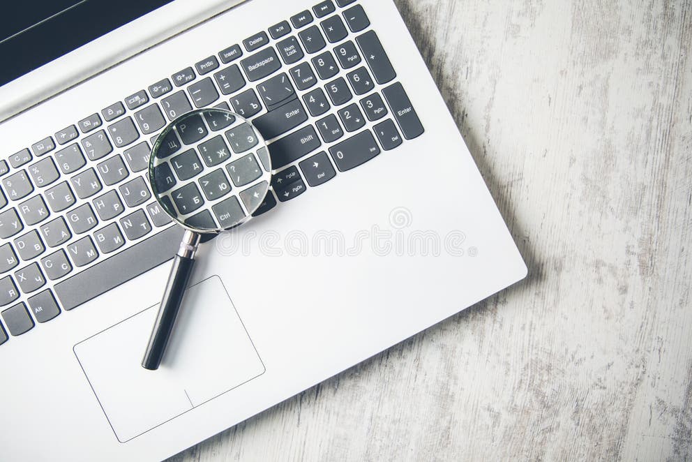 Magnifier on keyboard stock image. Image of office, look - 197157537