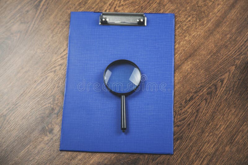 Magnifier on document stock photo. Image of work, accountant - 175912862