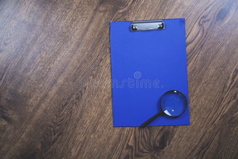 Magnifier on document stock photo. Image of workplace - 175913320
