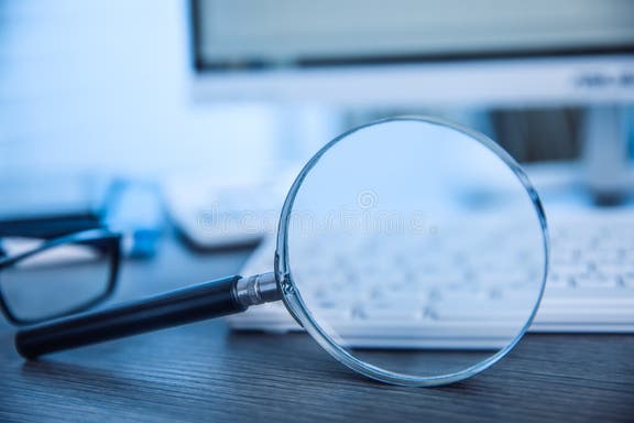 Magnifier with keyboard stock image. Image of business - 194581015