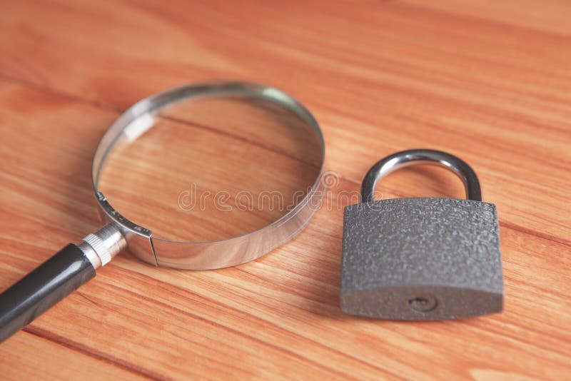 Magnifier and lock stock photo. Image of symbol, design - 235718874