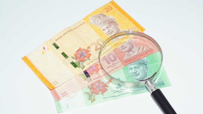 Magnifier with Malaysia Bank Notes.concept Photo. Stock Image - Image ...