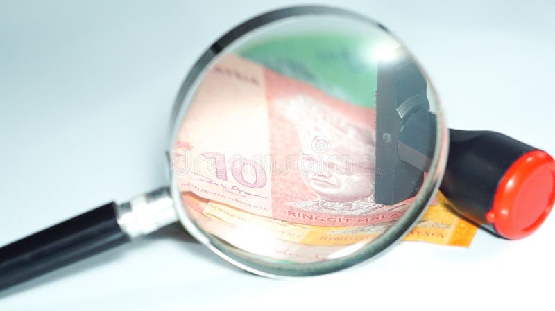 Magnifier and Rubber Stamp with Malaysia Bank Notes.concept Photo ...