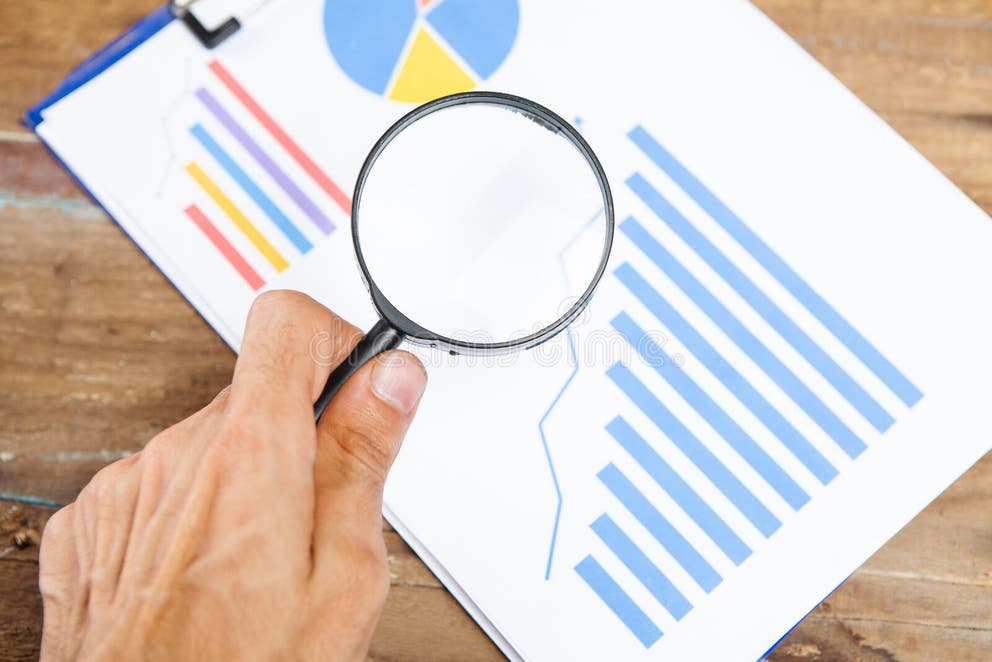 Magnifier on Statistical Graphs Stock Image - Image of magnifier, chart ...