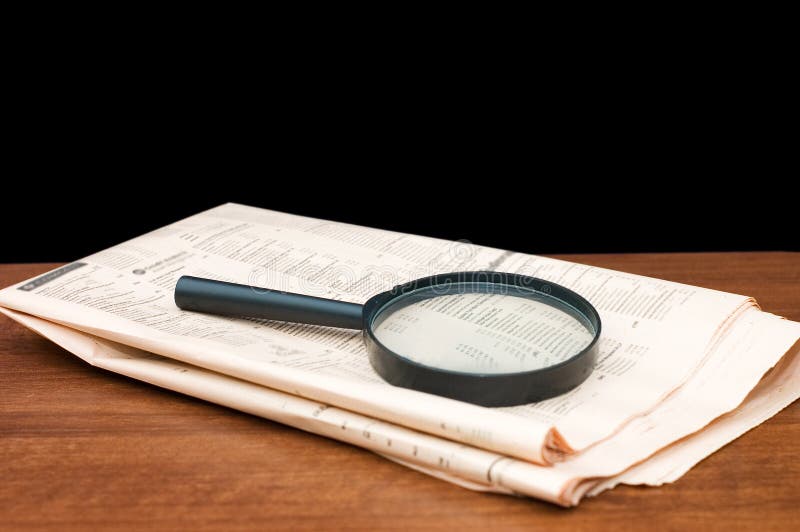 Magnify Glass Over a of Newspaper Stock Image - Image of concept ...