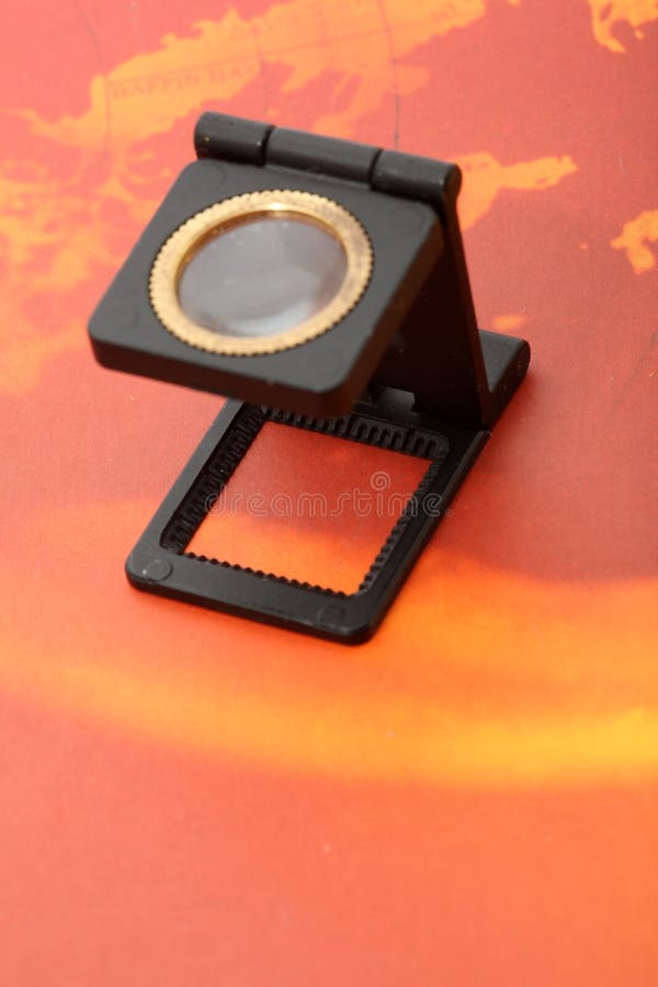 Press magnifying glass 2 stock photo. Image of passer - 1439348