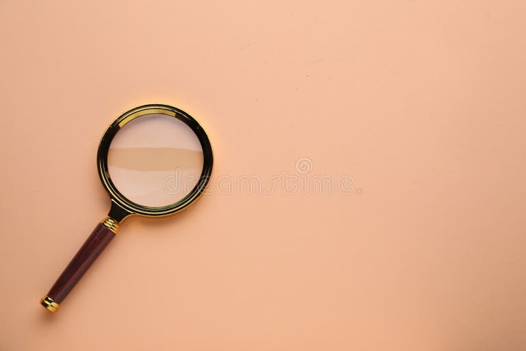 Magnifying Glass on Beige Background, Top View. Space for Text Stock ...