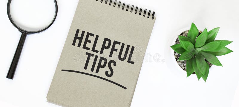 A Magnifying Glass, a Blank Brown Notebook on a White Table. HELPFUL ...