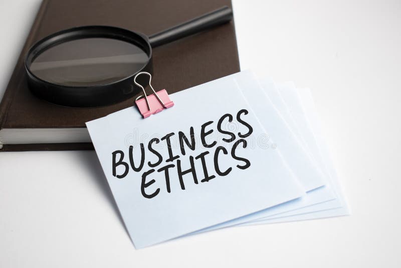 Magnifying Glass with Business Ethics Sign on the Paper Sheet Stock ...