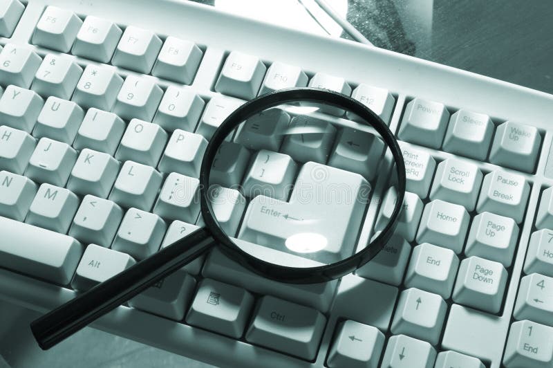 Laptop + Magnifying Glass stock photo. Image of search - 10910874