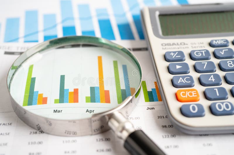 Magnifying Glass with Calculator on Graph Paper Stock Image - Image of ...
