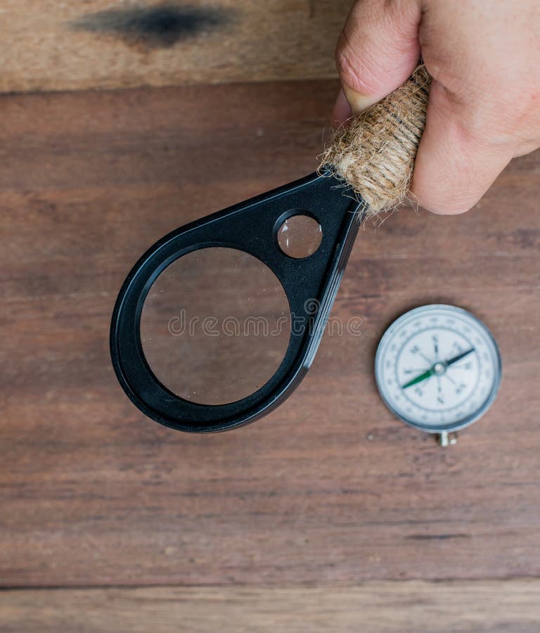 Magnifying Glass and Compass Stock Image - Image of read, analysis ...