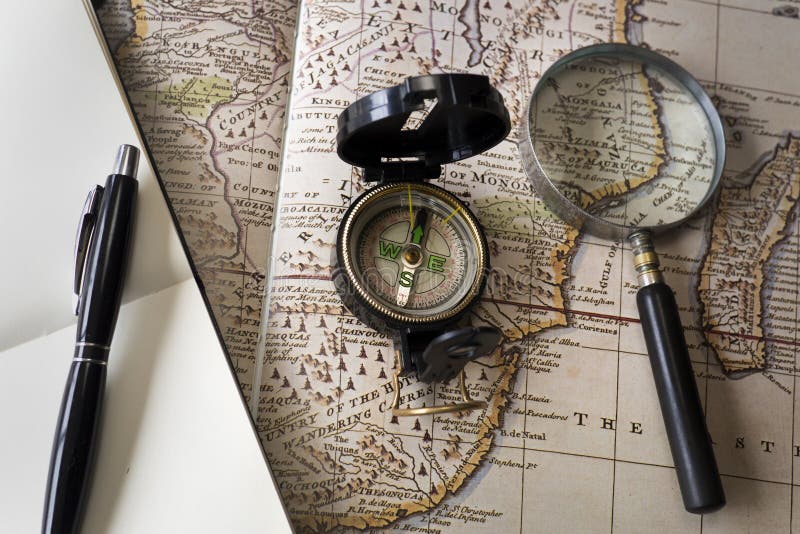 Magnifying Glass and Compass Stock Photo - Image of magnifying, holiday ...