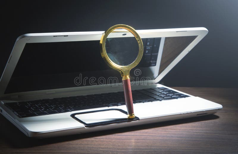 Magnifying Glass on the Computer Keyboard Stock Photo - Image of white ...