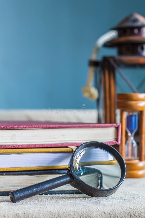 Magnifying Glass on the Desk Stock Photo - Image of black, paper: 60723562