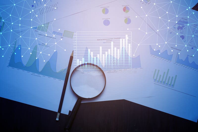 Magnifying Glass and Documents with Analytics Data Lying on Table Stock ...