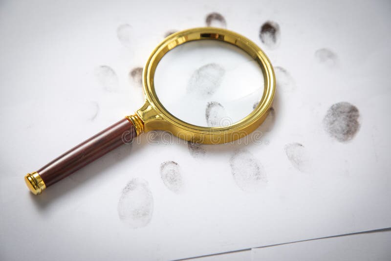 Magnifying Glass and Fingerprints. Detective Stock Image - Image of ...