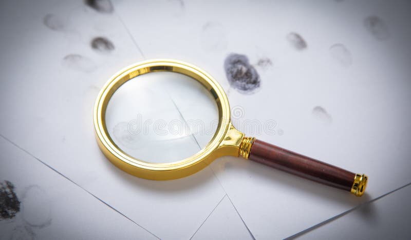 Magnifying Glass and Fingerprints. Detective Stock Photo - Image of ...