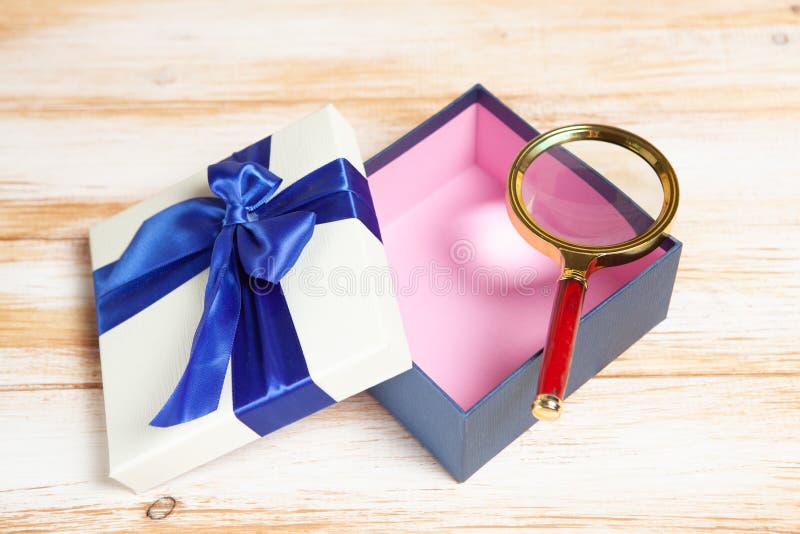 Magnifying Glass and a Gift Stock Photo - Image of christmas, pretty ...