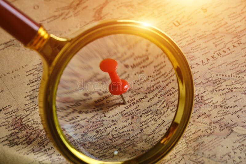 Magnifying Glass with Glare Sun and Red Button on Map Pointing To ...