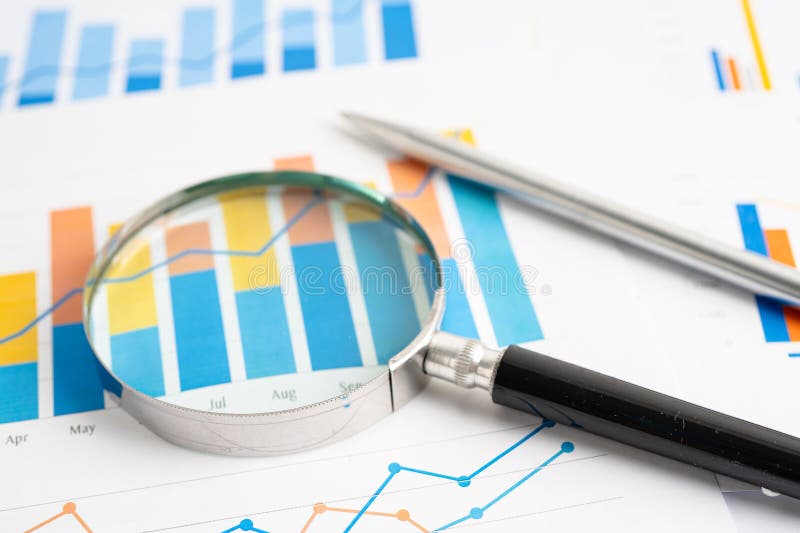 Magnifying Glass on Graph. Finance Business and Trading Stock Image ...