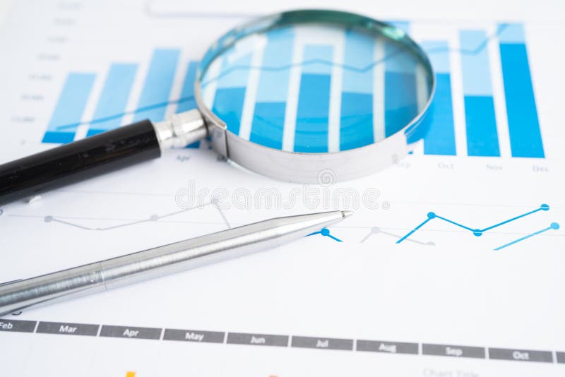 Magnifying Glass on Graph. Finance Business and Trading Stock Photo ...