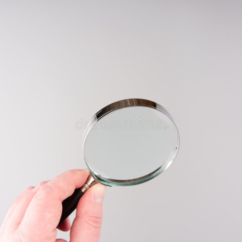 Magnifying Glass on a Gray Background. Space for Text Stock Photo ...