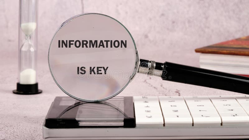 A Magnifying Glass Highlights the Phrase Information is Key on a ...