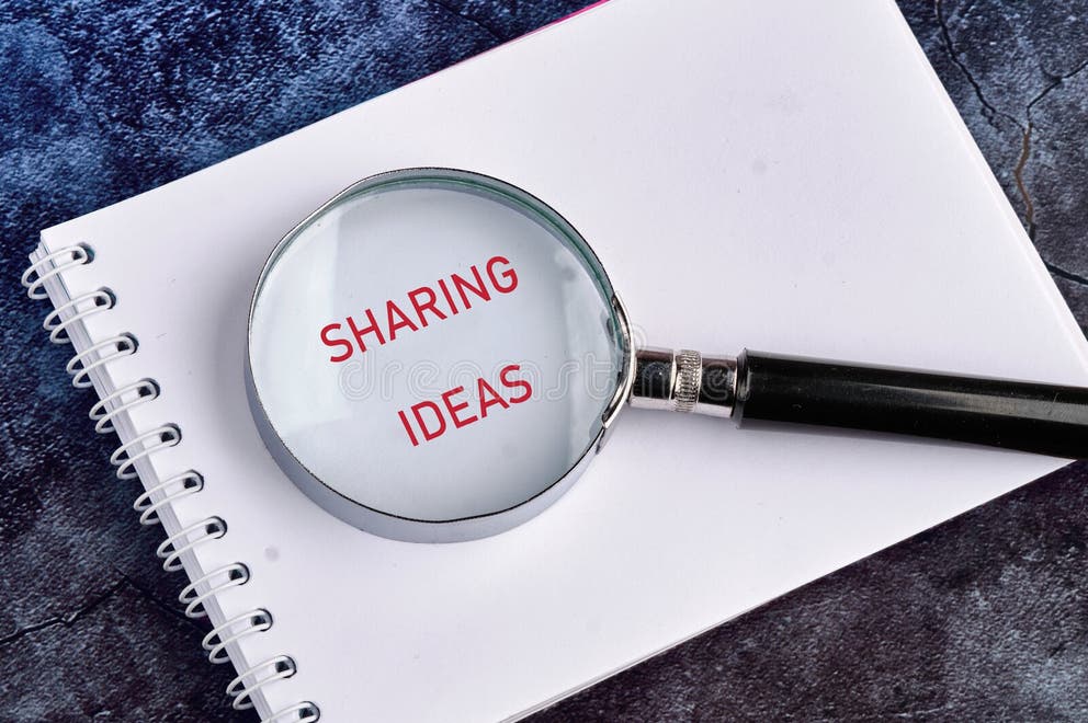 A Magnifying Glass Highlights the Phrase Sharing Ideas on a Notepad ...