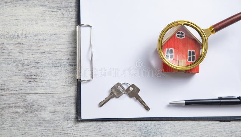 Magnifying Glass, House Model, Pen, Keys on the Clipboard Stock Photo ...