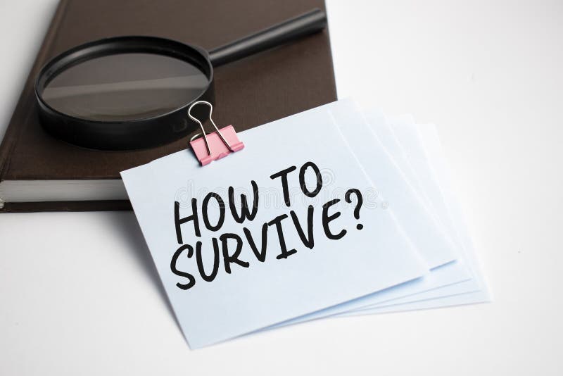 Magnifying Glass with How To Survive Sign on the Paper Sheet Stock ...