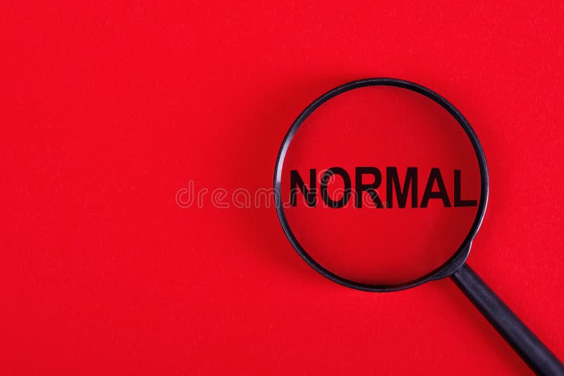 Magnifying Glass with the Inscription NORMAL on a Red Background Stock ...