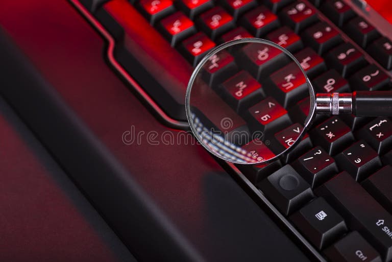 Magnifying Glass on the Keys of a Black Computer Keyboard Stock Image ...