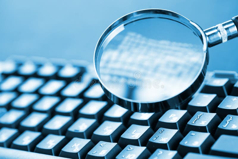 Magnifying Glass on the Keys of a Black Computer Keyboard Stock Image ...