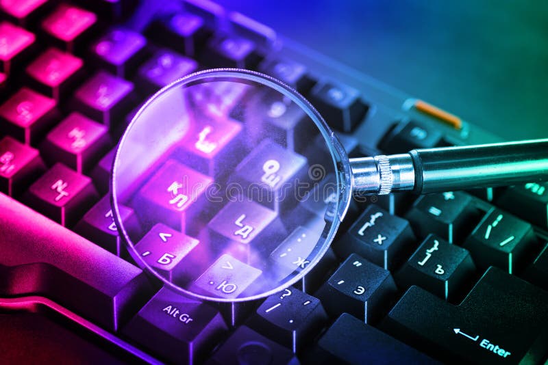 Magnifying Glass on the Keys of a Black Computer Keyboard Stock Photo ...