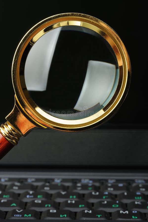 Magnifying Glass and a Laptop Stock Image - Image of display, focus ...
