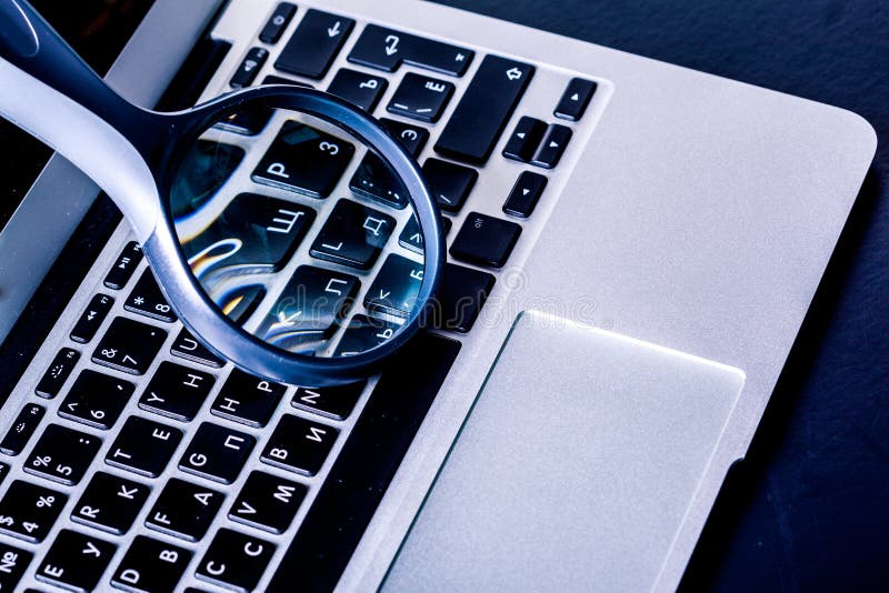 Magnifying Glass on Laptop Keyboard Stock Photo - Image of keyboard ...