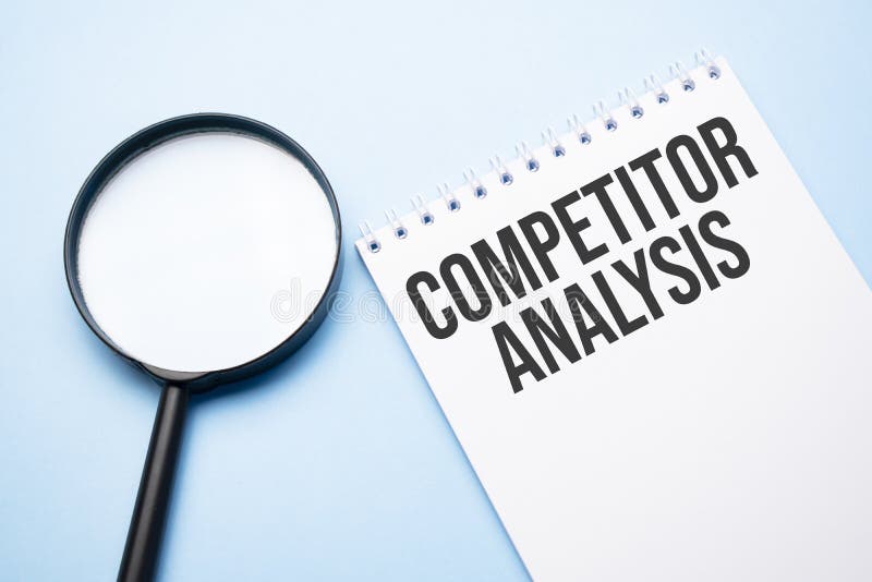 Magnifying Glass Loupe with Sign COMPETITOR ANALYSIS Blue Table Stock ...