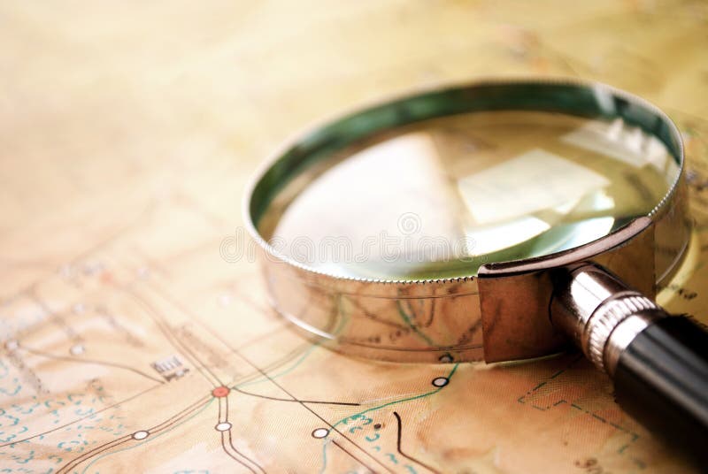 Magnifying Glass Lying on a Map Stock Image - Image of magnify, lens ...