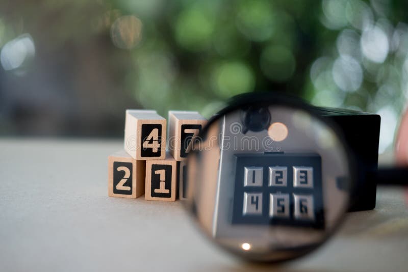 Magnifying Glass on the Number Pad Lock on Safe Box Stock Image - Image ...