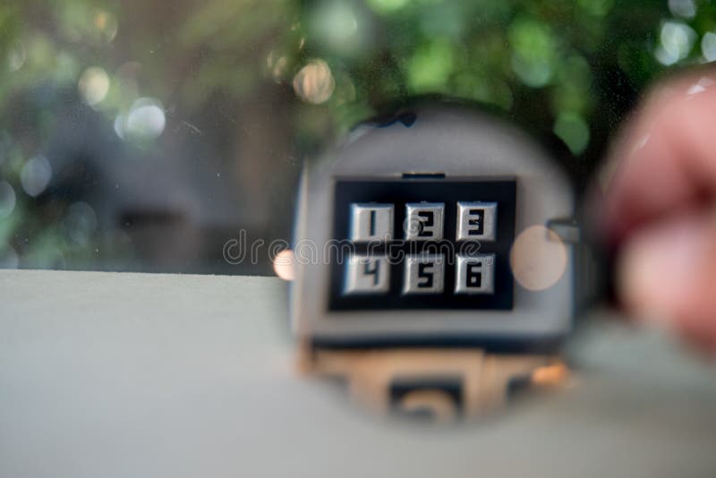 Magnifying Glass on the Number Pad Lock on Safe Box Stock Image - Image ...
