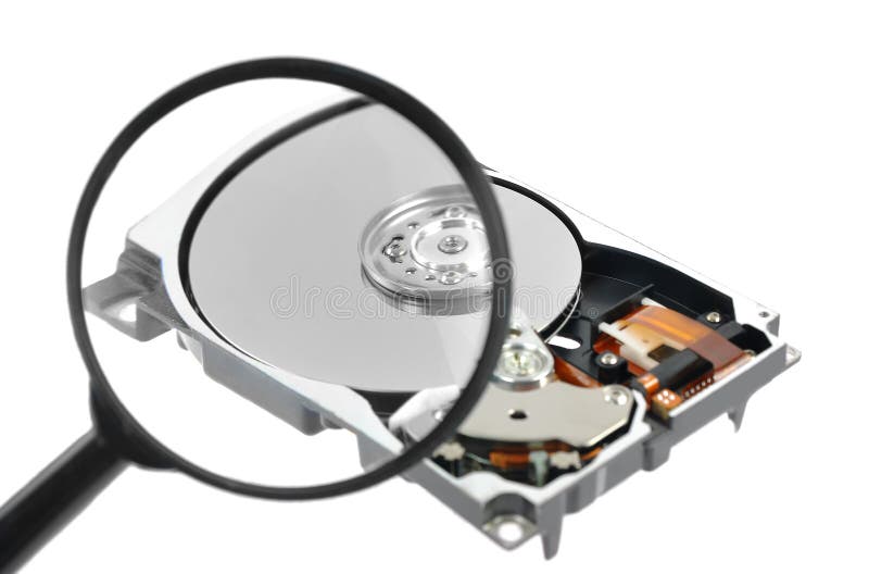 Magnifying Glass Over a Computer Harddrive Stock Photo - Image of ...