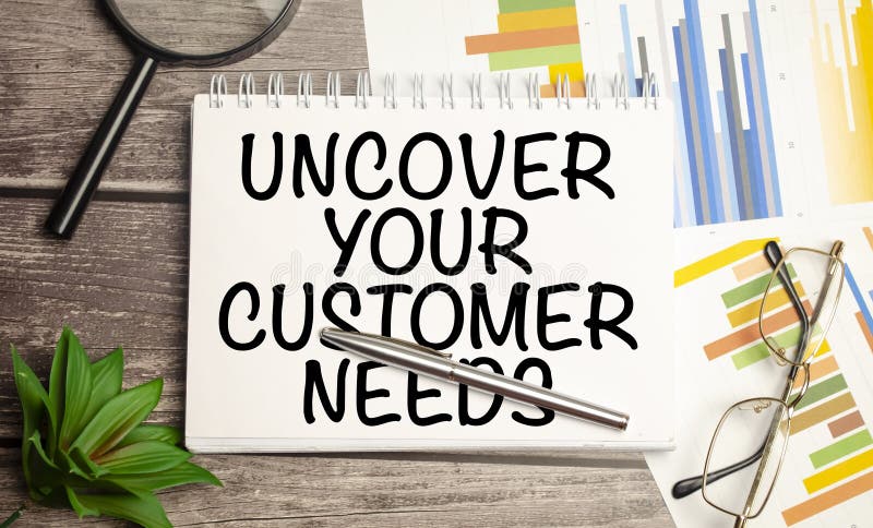 Magnifying Glass, Plant, Pen and a White Notebook with the Text Uncover ...