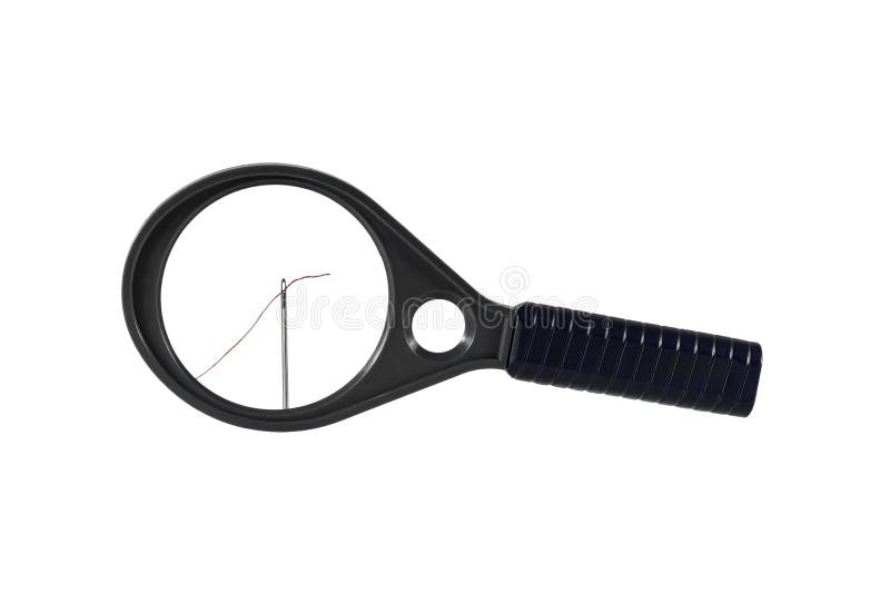 Magnifying Glass in a Plastic Frame with a Needle and a Thread Stock ...