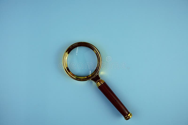 Magnifying Glass with Space for Copy Top View on Blue Background Stock ...