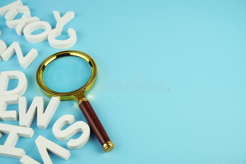 Magnifying Glass with Space for Text on Blue Background Stock Photo ...