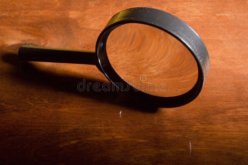 Magnifying Glass on the Table Stock Photo - Image of magnifier, library ...
